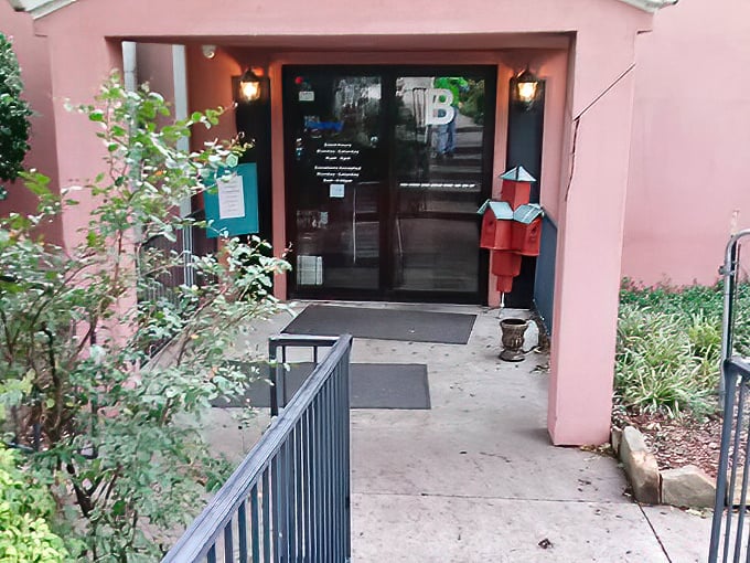 This pink entryway isn't just a door&mdash;it's a portal to possibility, where one person's castoffs become another's conversation pieces.
