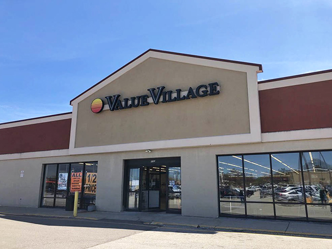 A thrift store palace under clear Wisconsin skies. The red trim says "stop here" while your wallet whispers "thank you."