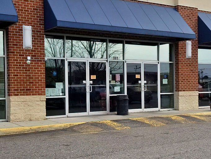 Those glass double doors might as well be a portal to another dimension&mdash;one where retail therapy doesn't require a credit limit increase.