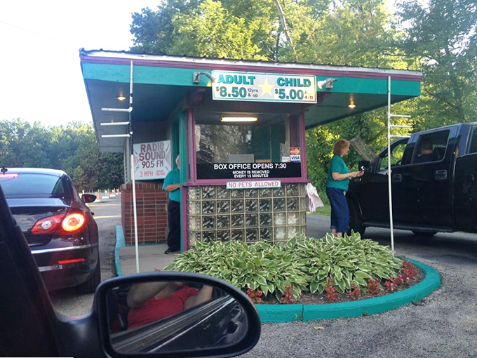 The ticket booth—where your evening adventure begins. That teal trim and glass block base scream mid-century charm in the best possible way.
