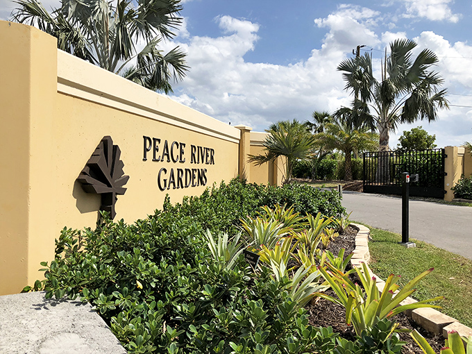 Not just any entrance&mdash;this is the golden gateway to botanical bliss, where even the sign seems to whisper, "You're about to see something special."