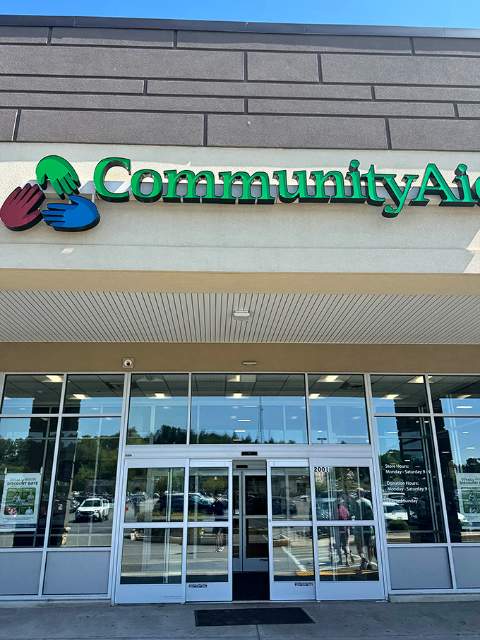 Three colorful hands form the logo, perfectly symbolizing the trifecta of thrifting magic: community support, environmental sustainability, and wallet-friendly prices.