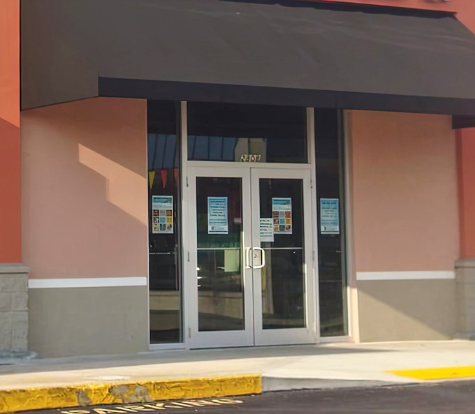 Those double doors might as well be portals to another dimension—one where your dollar stretches further than your grandmother's homemade taffy.