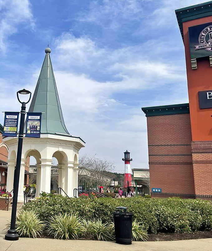 This architectural gem blends Southern charm with shopping paradise &ndash; note the spired gazebo and lighthouse beckoning bargain hunters like retail sirens.