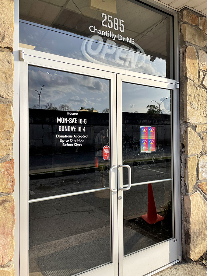 Business hours clearly displayed&mdash;the gateway to adventure. Remember when stores actually closed? This one gives you plenty of time to hunt.