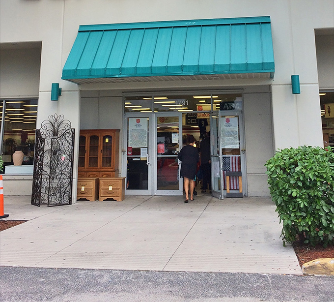 The entrance beckons like a portal to parallel universes where someone else's discarded furniture finds new purpose. That wrought iron garden piece is already calling your name.
