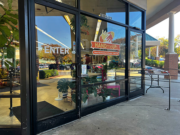 "Enter" promises the sign, but what it should really say is "Begin your adventure." The reflection of possibility gleams brighter than the glass itself.