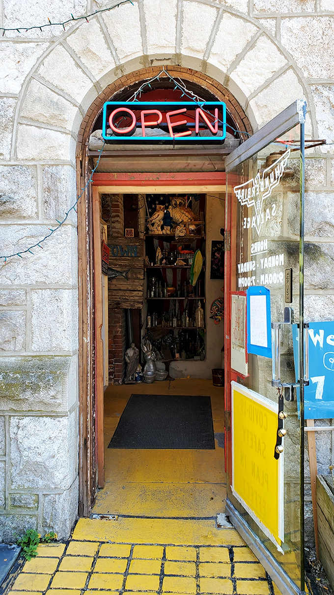 Step through this stone archway and you're no longer just shopping—you're embarking on a treasure hunt where the "Open" sign is really an invitation to adventure.