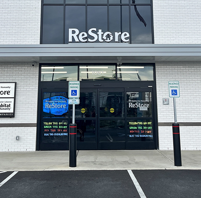 Color-coded tag discounts greet shoppers at this modern ReStore location. Yellow means 60% off? That's music to a thrifter's ears!
