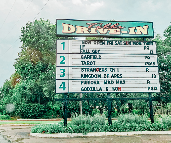 The classic marquee announces tonight's features across four screens. Where else can you catch Godzilla and Garfield on the same night?