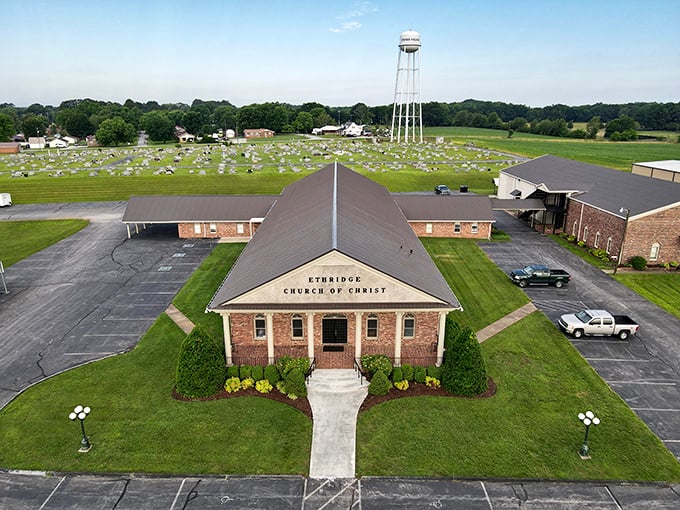 The Ethridge Church of Christ stands as a modern counterpoint to the surrounding Amish farms, where Sunday best means exactly that, regardless of century.