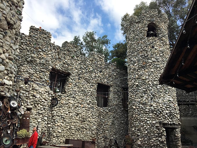 Every weathered river rock tells its own geological story in this extraordinary handcrafted fortress.