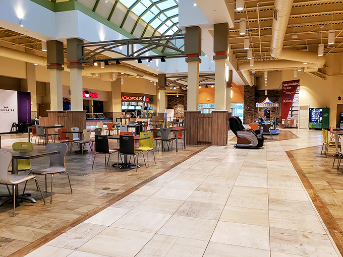 The food court: where shopping warriors refuel and husbands pretend they're not secretly enjoying the day's retail adventures.