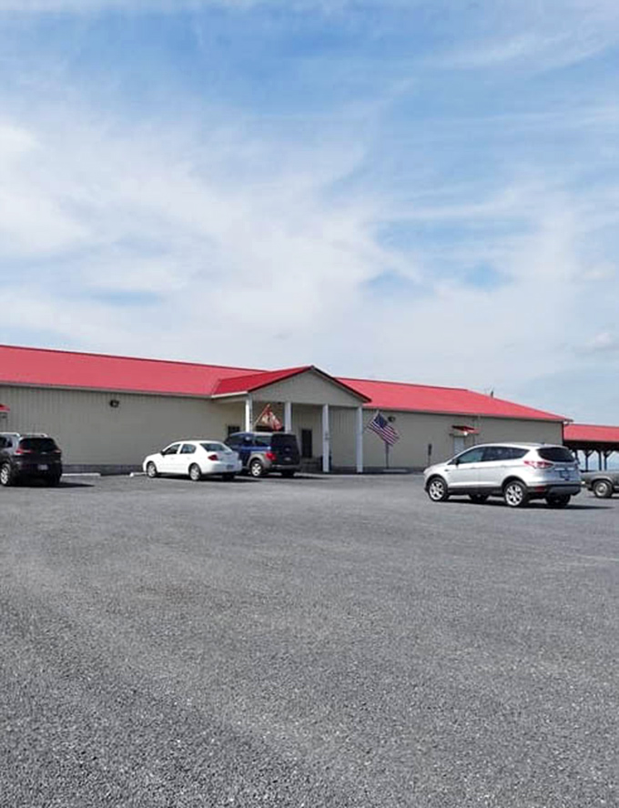 The unassuming exterior with its signature red roof belies the wonderland of treasures hiding inside. First-time visitors are never prepared for what awaits.