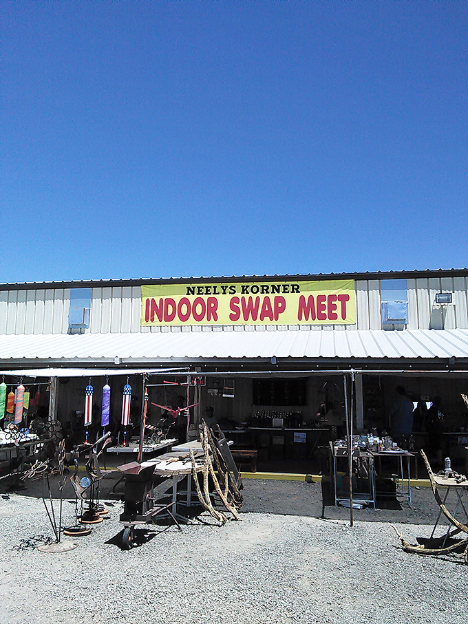 A colorful array of flags flutter above tables laden with everyday artifacts and extraordinary finds—democracy in action at this Golden Valley marketplace.