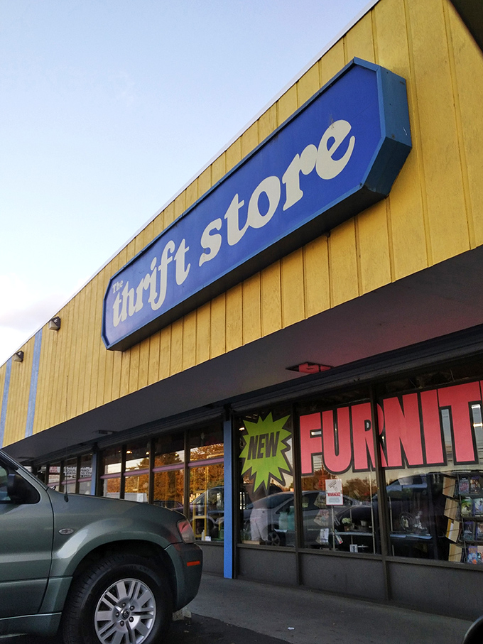 That retro-fabulous sign against the bright yellow building isn't just advertising&mdash;it's practically winking at you, saying "Come find something wonderful today!"