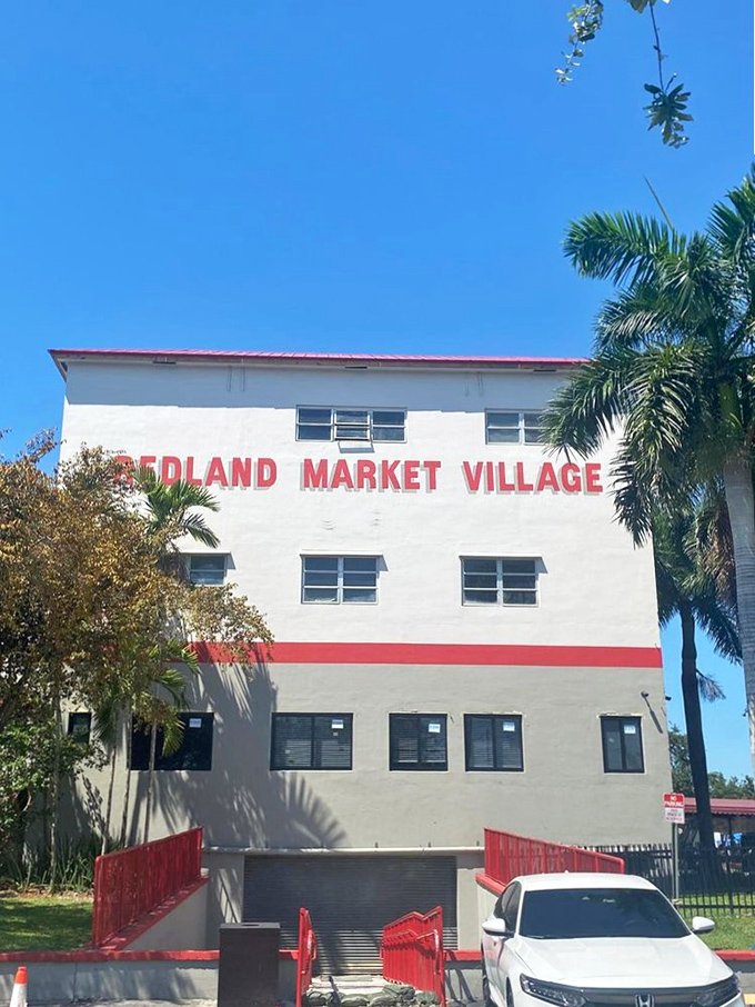 Palm trees frame this South Florida landmark where shopping isn't just a transaction but a full-contact sport for deal enthusiasts.