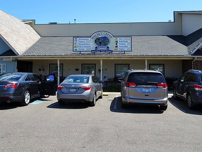 The market's exterior hints at the treasure trove of flavors waiting inside, where both cars and buggies find equal parking.