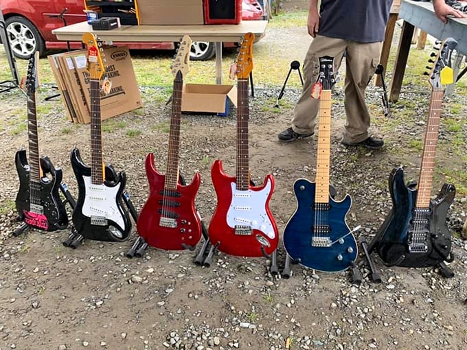 Rock star dreams on display! A lineup of electric guitars just waiting for their next Eddie Van Halen or Bonnie Raitt.