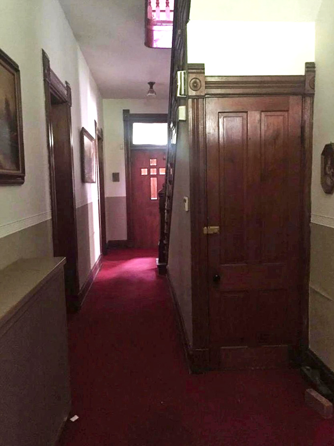 This hallway doesn't just lead to another room&mdash;it's practically begging you to whisper, "Hello? Is anyone there?" The red carpet adds a theatrical touch.