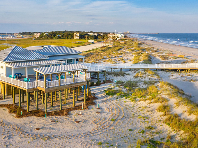 Beach architecture that means business. The elevated pavilion stands as a coastal sentinel, offering shade and spectacular views to sun-kissed visitors.
