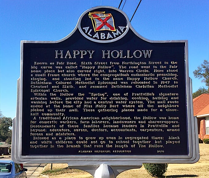 The Happy Hollow historical marker tells the story of a vibrant community where neighbors gathered at the spring and children played in the branch.