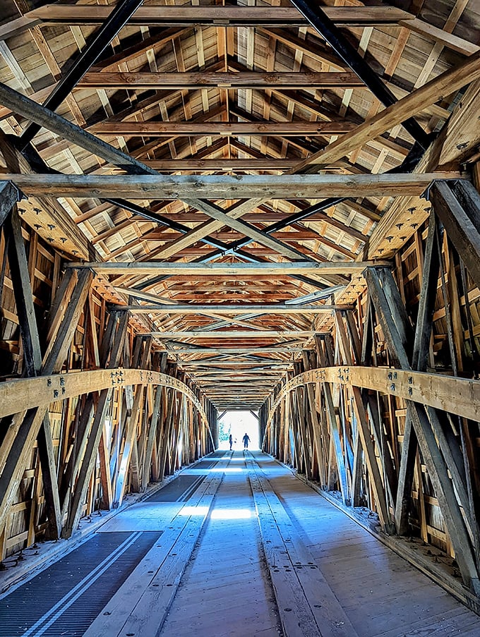 Architectural poetry in timber and shadow. Walking through feels like stepping inside a wooden cathedral built by Gold Rush engineers.