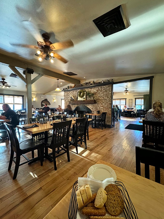 Step inside to discover what heaven's dining room might look like&mdash;warm wood, stone fireplace, and the promise of prime rib perfection.