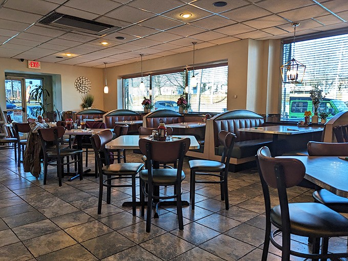 Inside, comfortable booths and practical tables create that perfect "everybody knows your name" atmosphere where conversations flow as freely as the coffee.