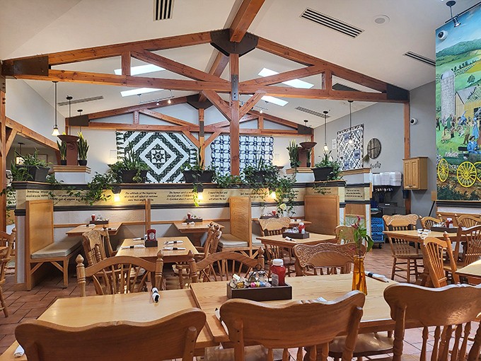 Exposed wooden beams and handcrafted quilts transform this dining room into a cathedral of comfort food. Grandma would approve of these surroundings.
