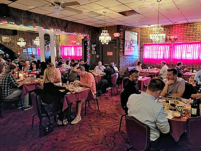 Pink tablecloths, chandeliers, and wood paneling create the perfect retro atmosphere where Frank Sinatra would feel right at home ordering a ribeye and a martini.