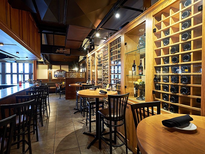 Wine lovers rejoice! The impressive wooden racks aren't just for show&mdash;they're a preview of the perfect pairing awaiting your steak.