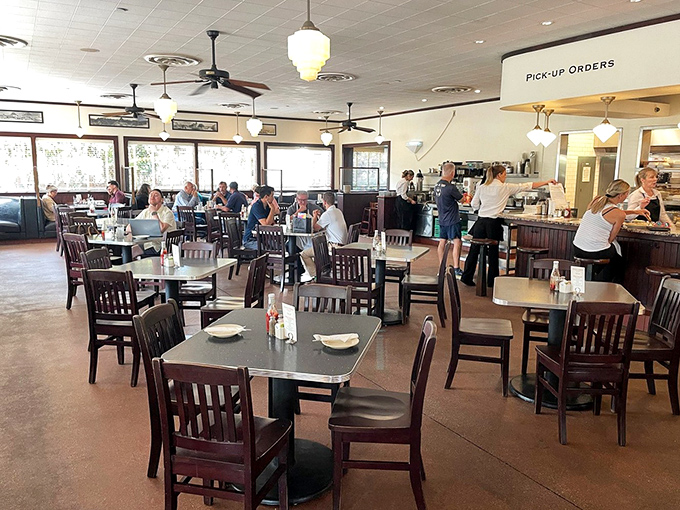 Inside Monument Cafe, time slows down as ceiling fans lazily spin above wooden chairs and polished tables. The perfect setting for conversations that last longer than your coffee.