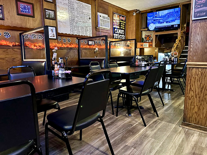 Wood paneling and vinyl booths create the perfect backdrop for serious comfort food conversations.