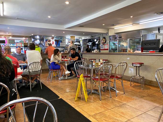 No-frills dining at its finest. Chrome chairs, tile floors, and the beautiful chaos of a place where the food, not the decor, does all the talking.