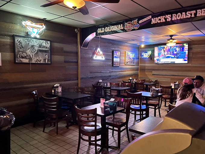 Step inside and you're transported to a Philadelphia time capsule&mdash;wood paneling, sports memorabilia, and the intoxicating aroma of slow-roasted meat that makes waiting worthwhile.