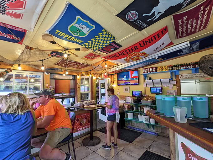 Soccer scarves and fishing nets adorn the ceiling like trophies of good times past, while cold drinks promise more memories to come.