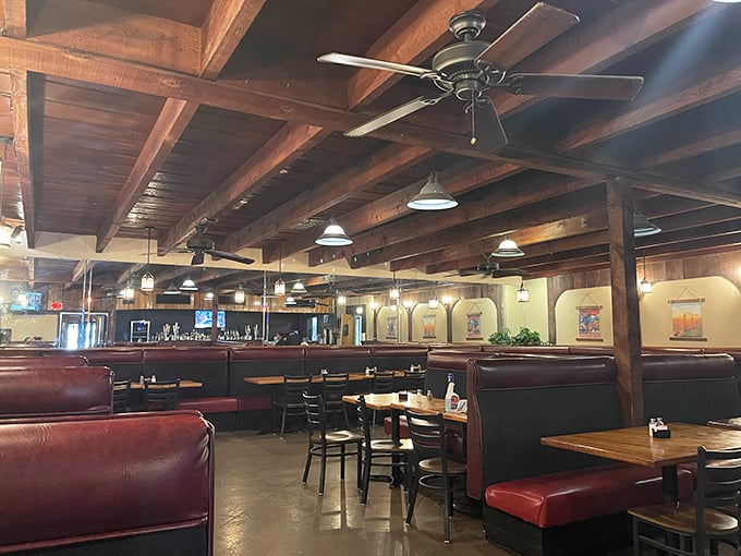 Wooden beams and red leather booths &ndash; the universal language of "serious steak is served here." Comfort never goes out of style.
