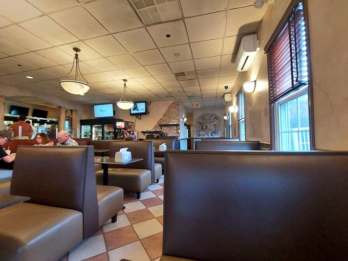 Cozy booths, checkered floors, and the warm glow of pendant lighting create the perfect backdrop for pizza perfection. This isn't just dining; it's a Pennsylvania tradition in the making.