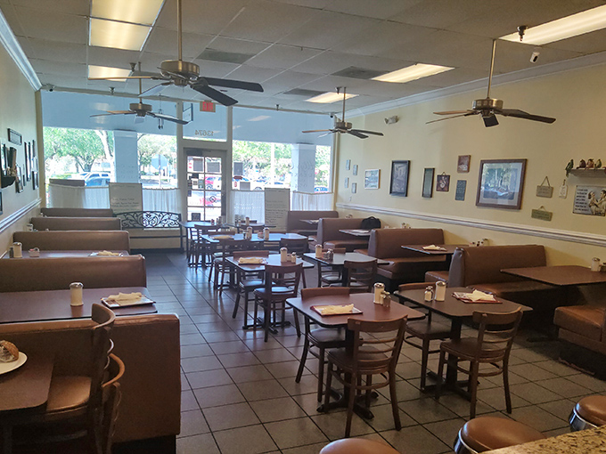 Inside, ceiling fans lazily spin above a sea of comfortable booths and tables, creating that perfect "everybody knows your name" atmosphere that's becoming increasingly rare.