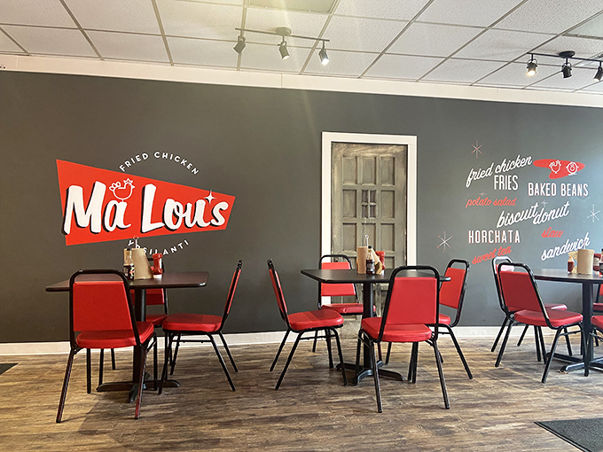 Simple yet stylish, the interior's gray walls and red chairs create the perfect backdrop for the real star&mdash;that chicken you're about to devour.