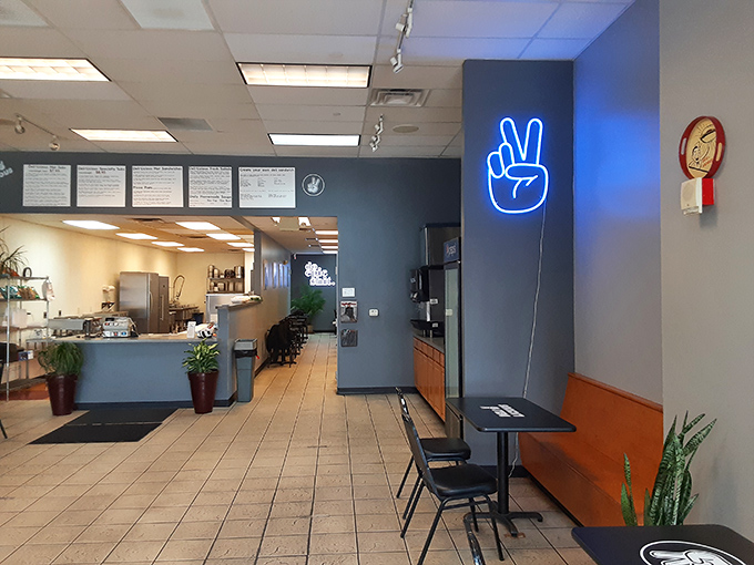 That blue neon peace sign isn't just decor&mdash;it's a promise of the harmony your taste buds will experience once you've ordered.