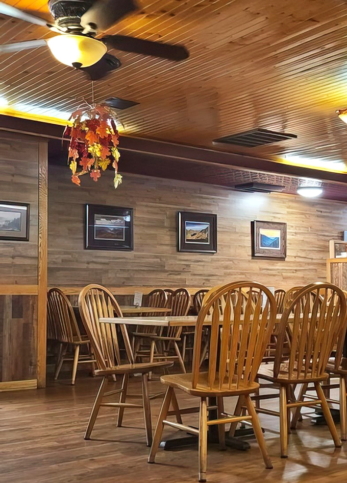 Wood-paneled walls and autumn leaves create the kind of cozy that makes you forget about your diet.