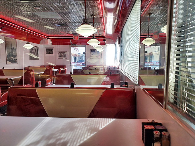 Red vinyl booths and pressed tin ceilings transport you to simpler times. This isn't retro by design&mdash;it's the authentic article, preserved like a delicious time capsule.