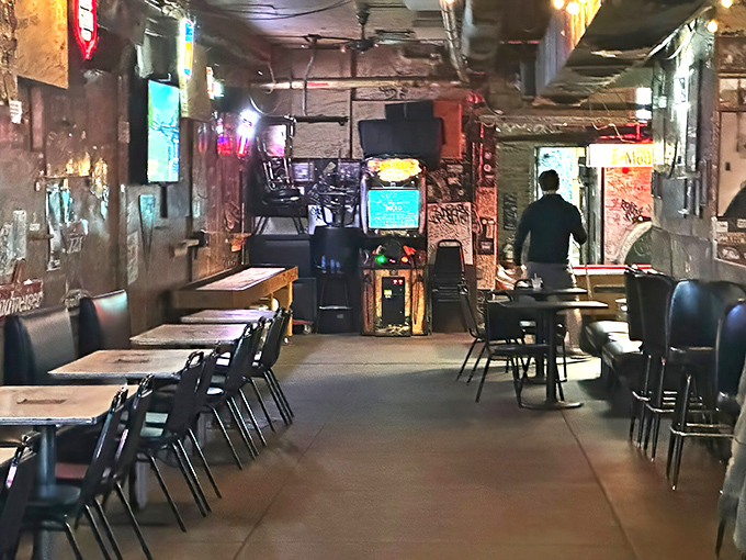 Where worn wood floors and glowing signs create the perfect backdrop for legendary burgers and cold beer.