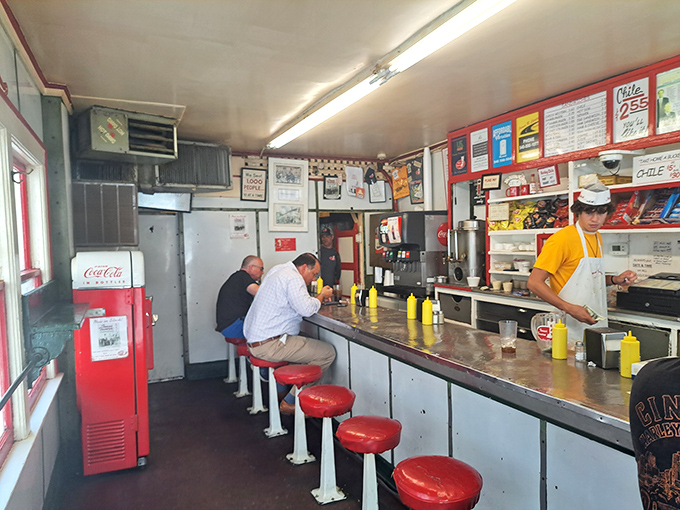 Inside, the narrow counter and classic red stools offer front-row seats to culinary theater that's been playing to packed houses for generations.