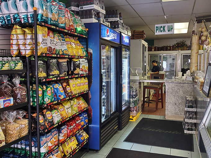 Shelf meets stomach in this no-frills interior where potato chip options rival the sandwich menu. Classic deli perfection awaits.