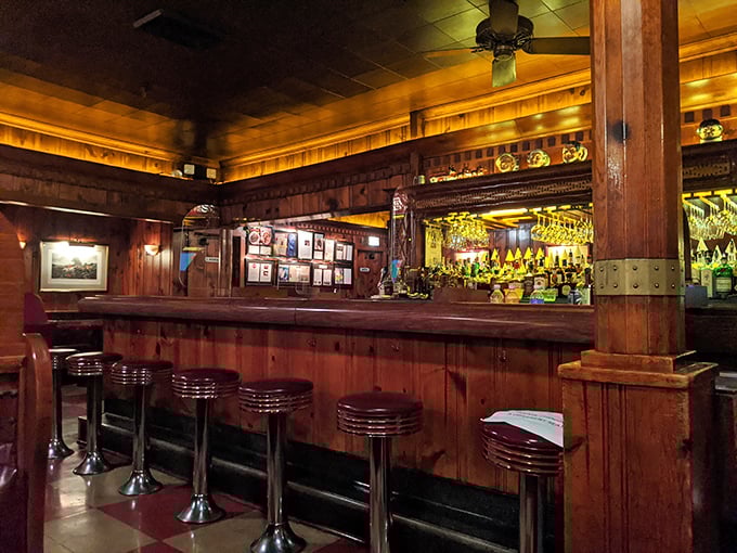 Step inside and time stands still &ndash; dark wood paneling, classic bar stools, and an atmosphere that whispers, "Put your phone away and enjoy your steak."