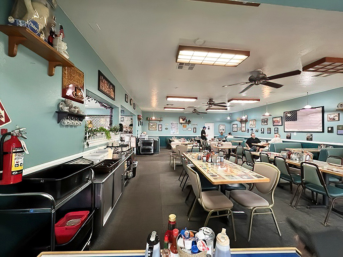 Turquoise walls and vinyl booths create the perfect backdrop for serious breakfast business and friendly conversation.