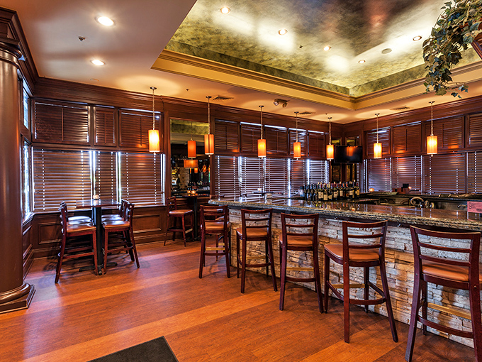 The bar area's warm wood tones and amber lighting create that magical hour when decisions narrow to: "Red or white wine with dinner?"